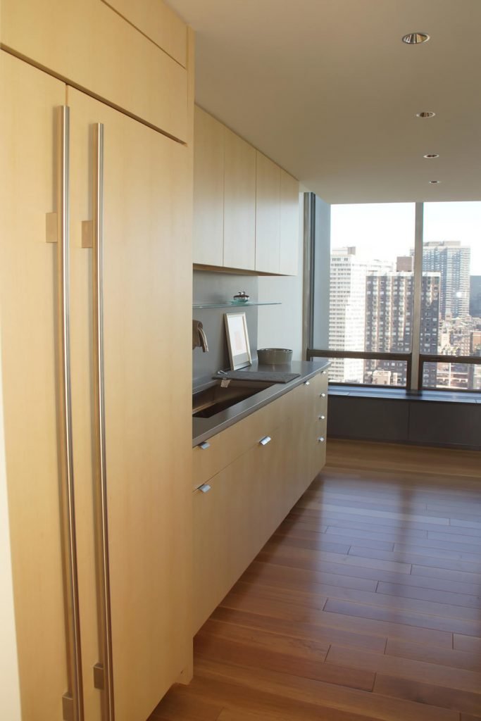Integrated doors conceal the refrigerator, while the addition of a ...